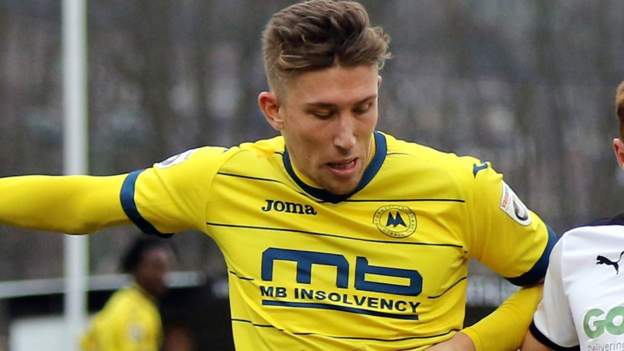 Angus MacDonald: Torquay United captain and defender signs new contract ...