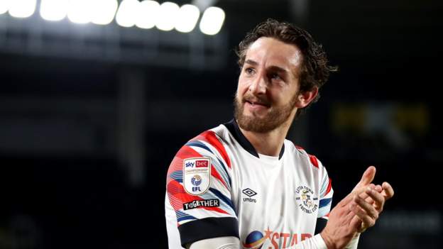 Tom Lockyer: Luton captain signs new deal and trains after operation ...