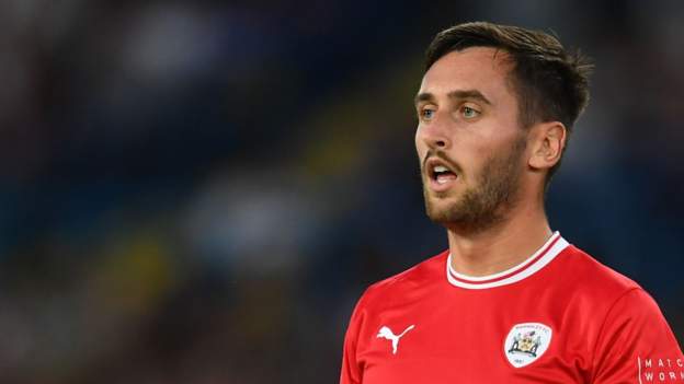 Conor McCarthy: Barnsley defender out for nine months with serious knee ...