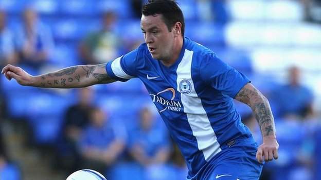Peterborough United's Lee Tomlin joins Middlesbrough permanently - BBC ...