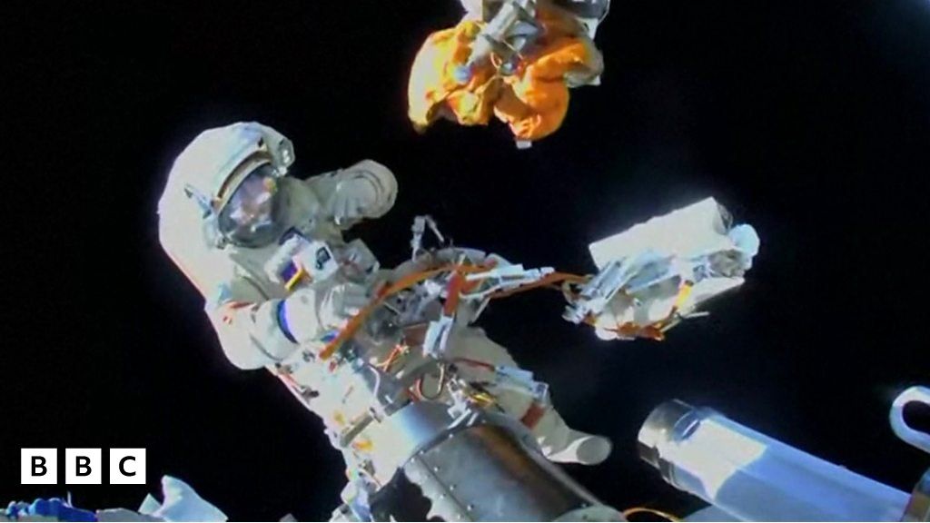 ISS: Cosmonauts discard space junk during spacewalk - BBC Newsround
