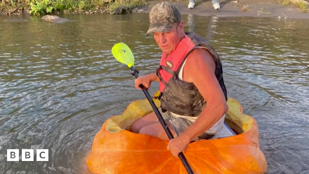 Man breaks world record for riding down river... in a pumpkin! - BBC ...