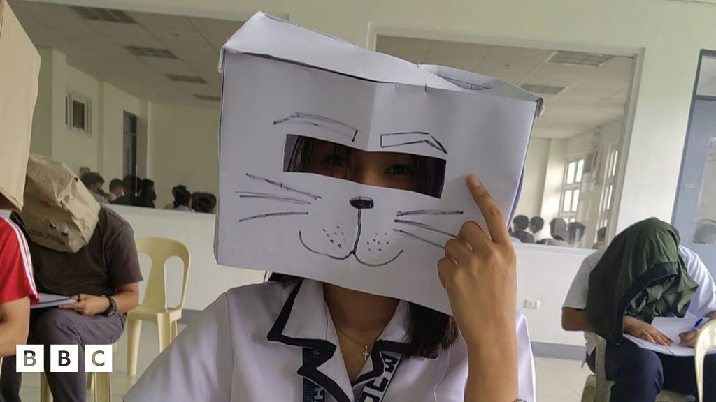 Students wear homemade 'anti-cheating' hats during exam - BBC Newsround