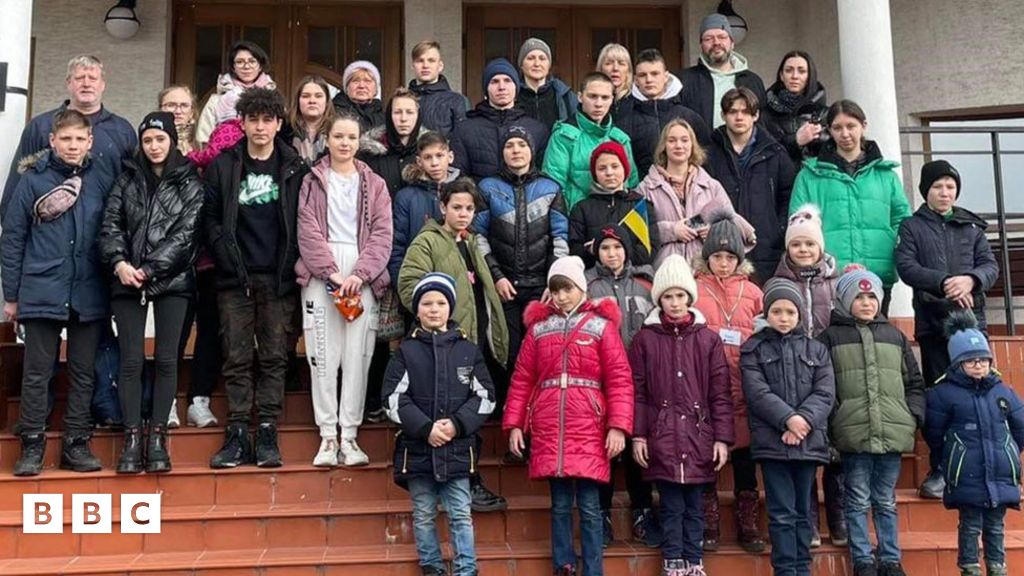 Ukrainian orphan group arrive in Scotland - BBC Newsround