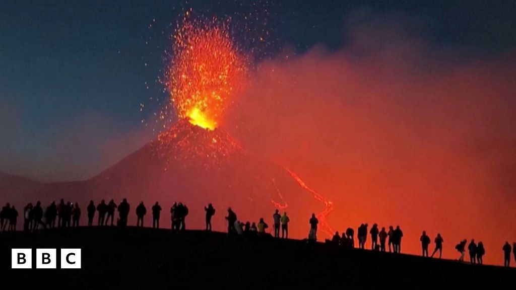 Watch: Mount Etna erupts over Italy - BBC Newsround