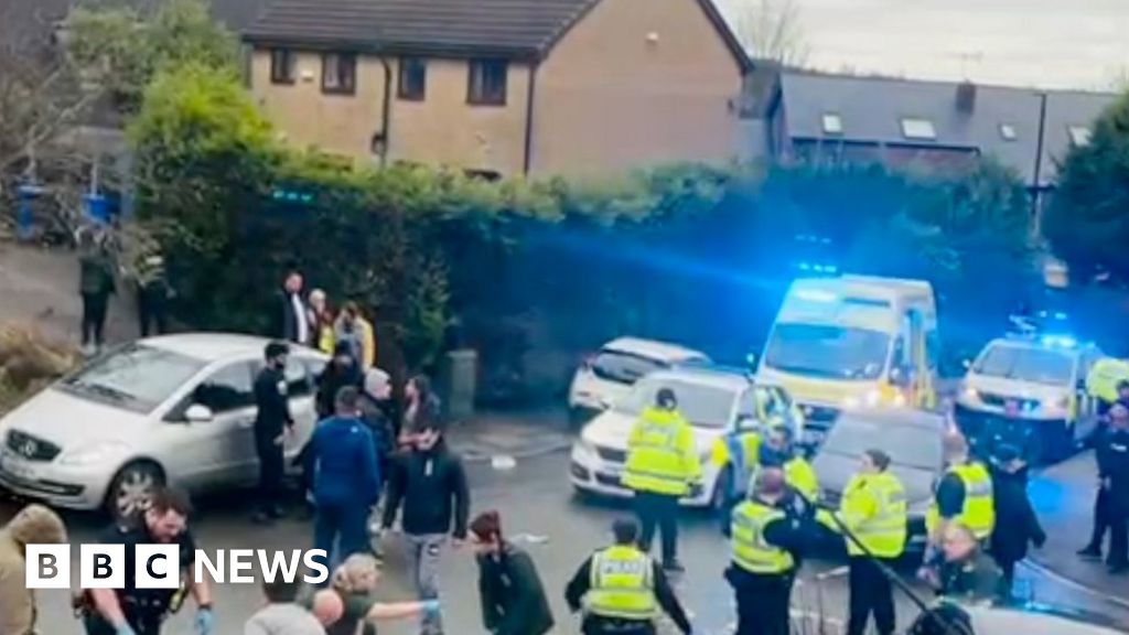 Sheffield murder investigation continues after car hits crowd - BBC News