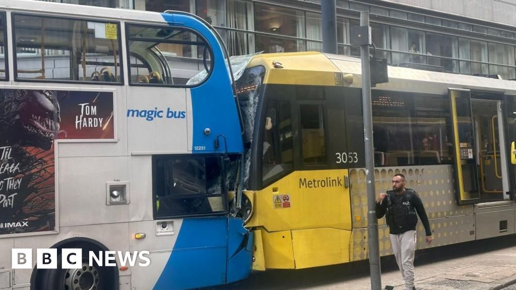 Manchester city centre: Bus and tram in head-on collision - BBC News