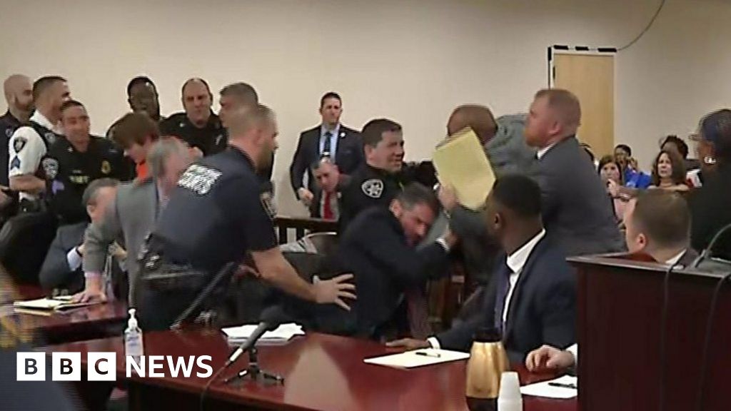 Victim's relative runs at Buffalo gunman in court