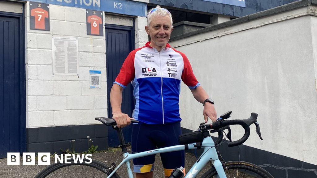 Luton Town fan completes 118-stadium cycle challenge - BBC News