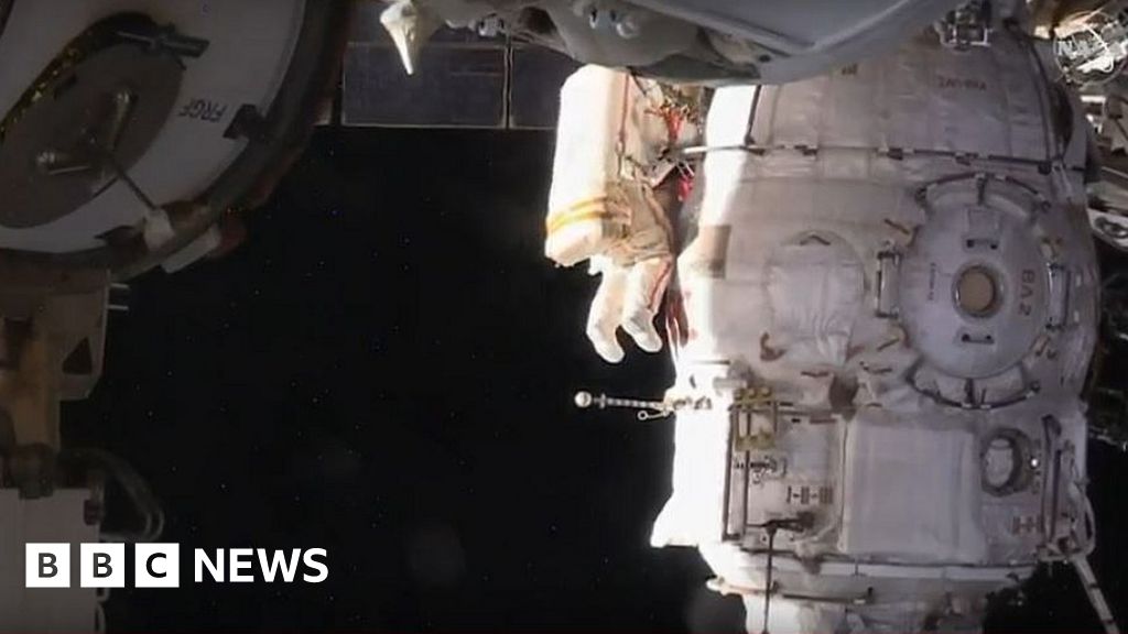 ISS: Spacewalk cosmonauts investigate mystery hole