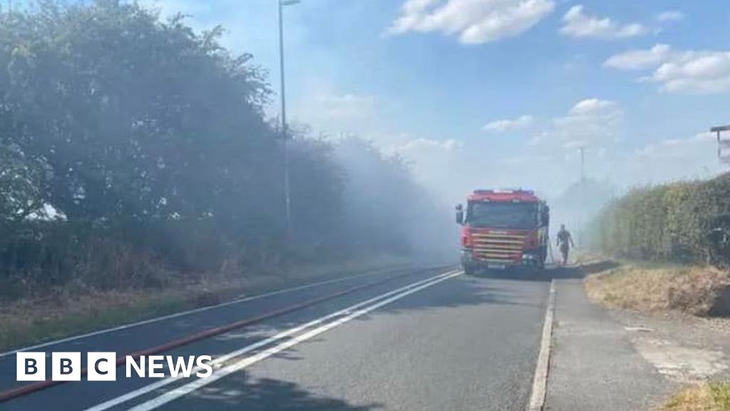 Kirkby homes face power cuts as fire crews battle blaze - BBC News