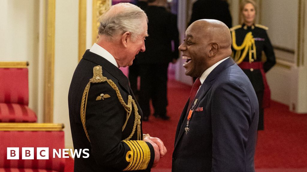 Ainsley Harriott receives 'very special' MBE from Prince Charles - BBC News