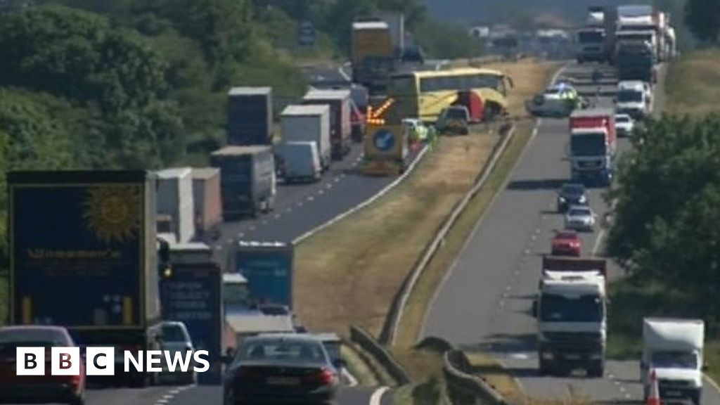 A1 closes after bus and car crash near Colsterworth - BBC News