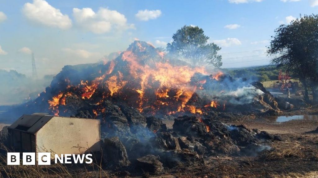 Fire crews tackle countryside haystack blaze in Swillington - BBC News