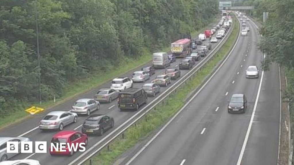 A470 crash: Man critical after falling from moving van - BBC News