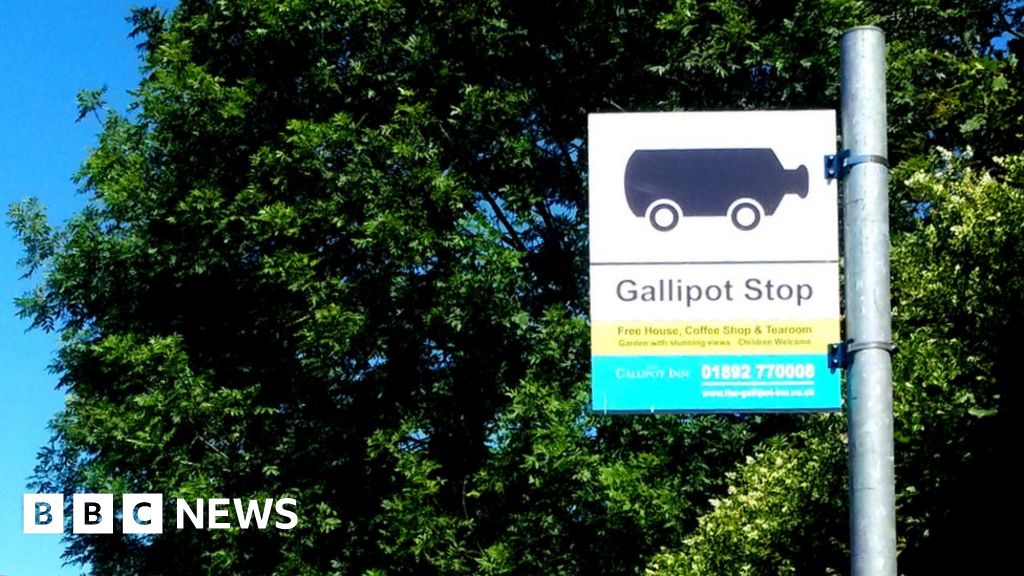 Fake bus stop gives village pub in East Sussex a visitor boost - BBC News
