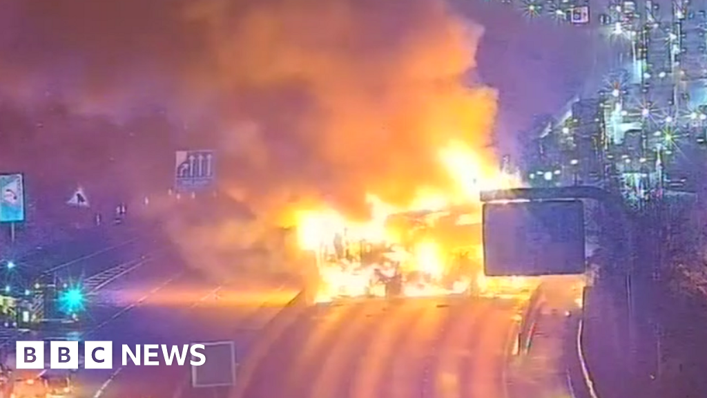 M25: All lanes open after extensive lorry fire clean-up operation - BBC ...