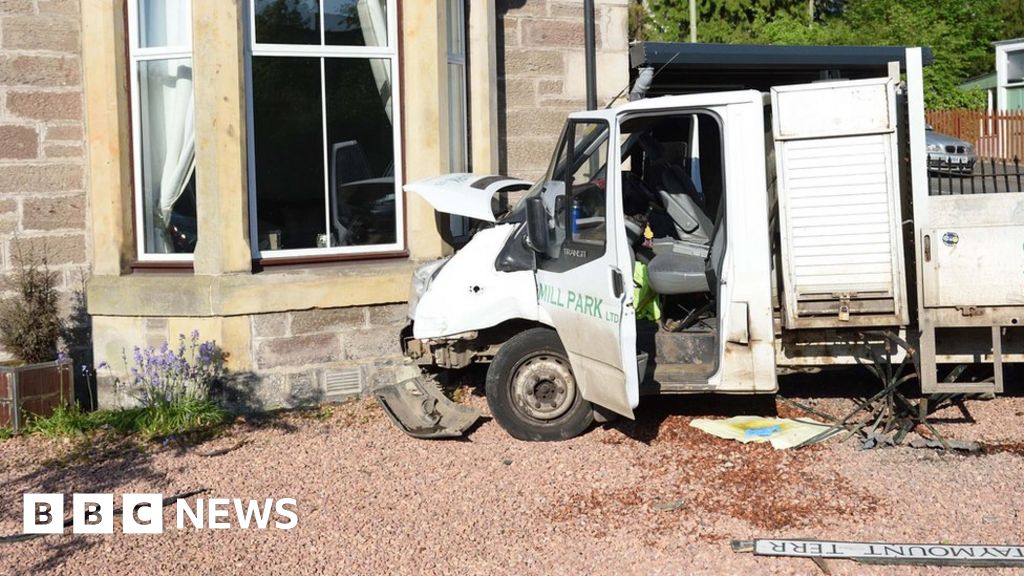 Van crashes into house following two-vehicle collision - BBC News