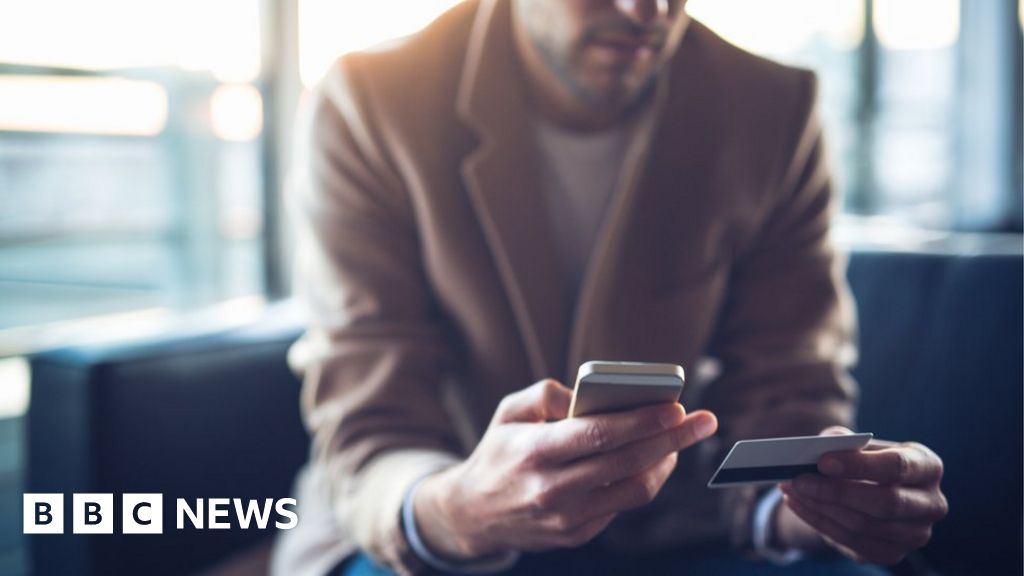 Lack of bank account 'costs £500 extra a year' in bills - BBC News