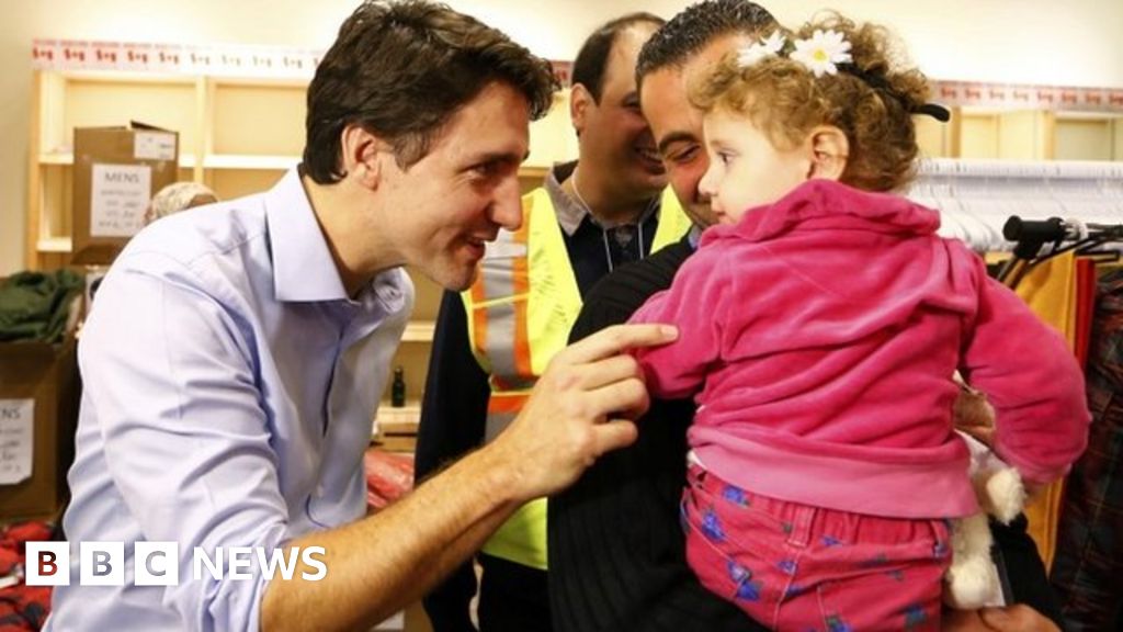Pm Trudeau Welcomes Syrian Refugees To Canada Bbc News