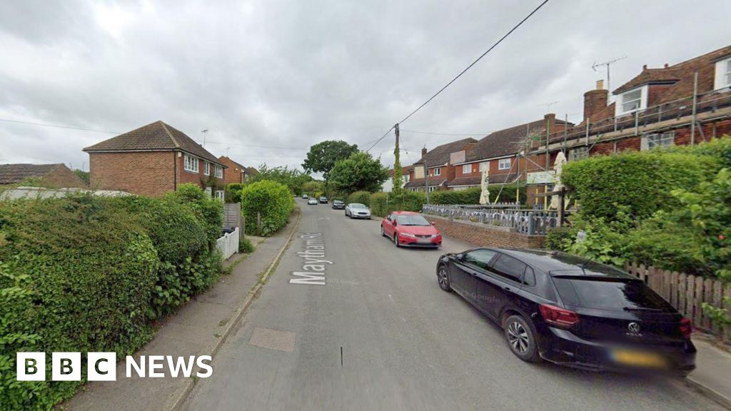 Cyclist dies after crashing into stationary car door in Rolvenden - BBC News