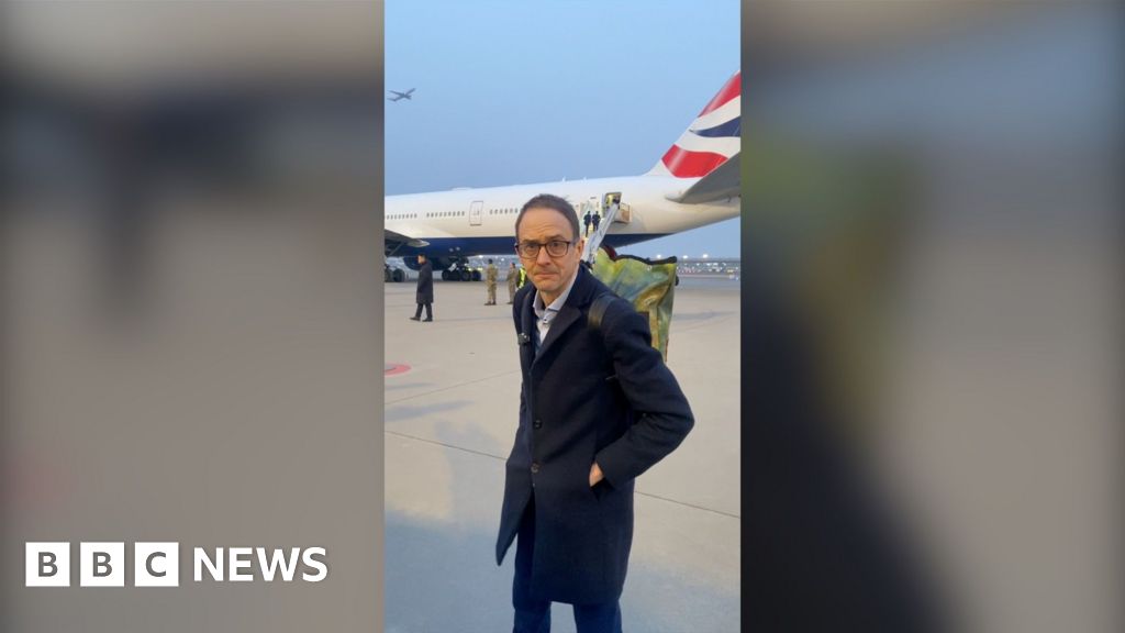 Chris Mason reports from the tarmac in Beijing - BBC News