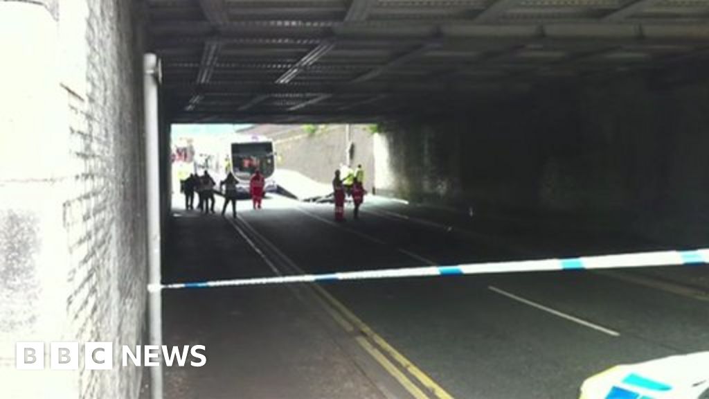 Rochdale bus crash: Seventeen hurt as roof shears off - BBC News