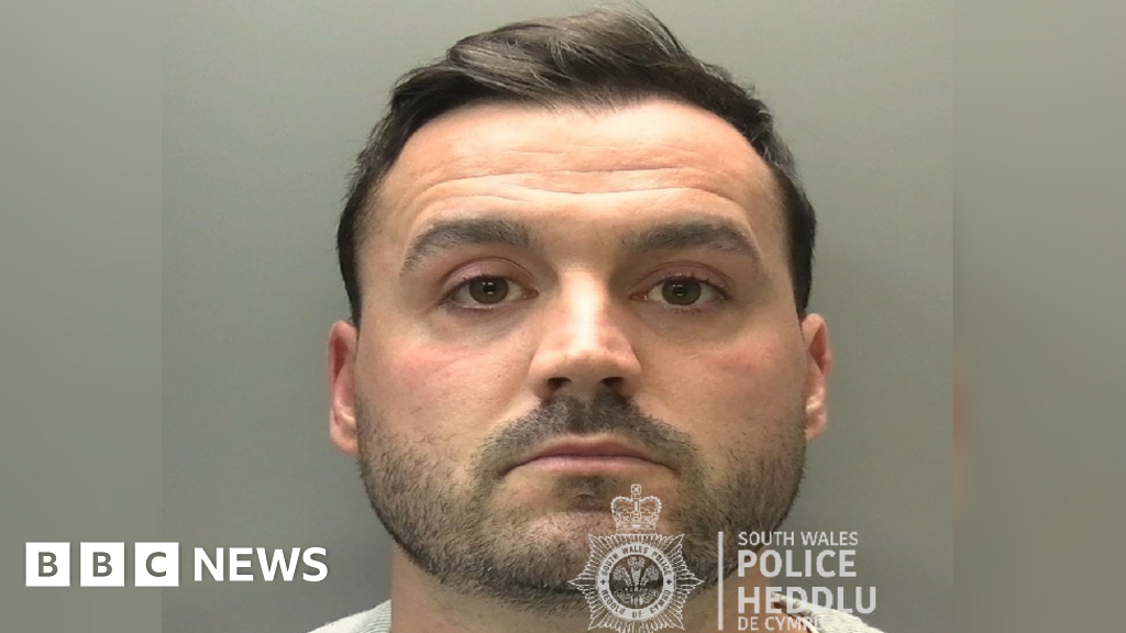 South Wales Police officer Ben Cook jailed for burglaries - BBC News