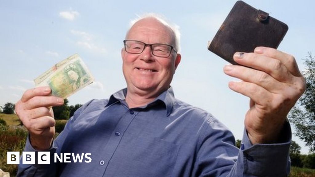 Lost wallet found behind train seat after 30 years - BBC News