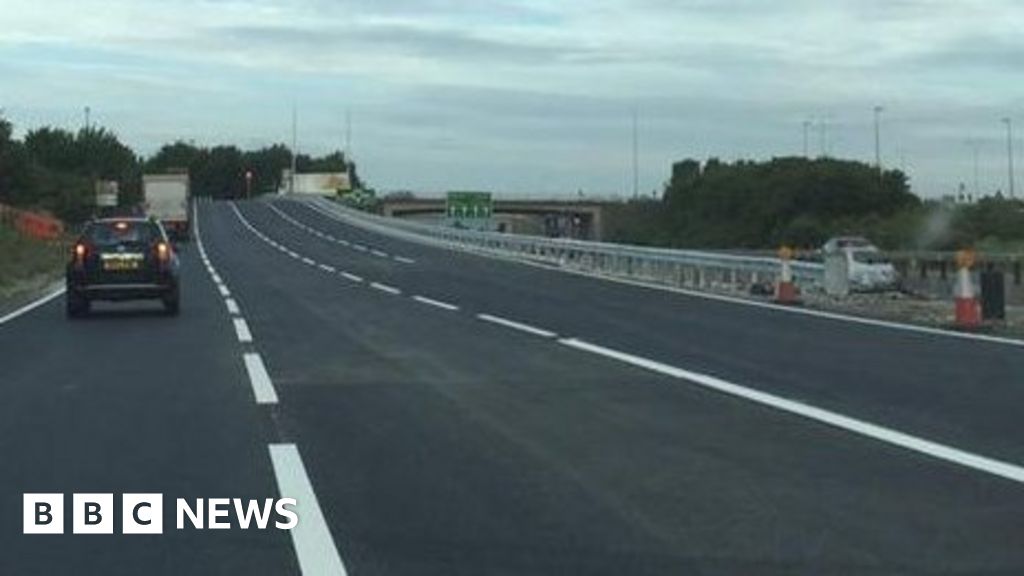 Three-month overdue roadworks on Wrexham border finished - BBC News