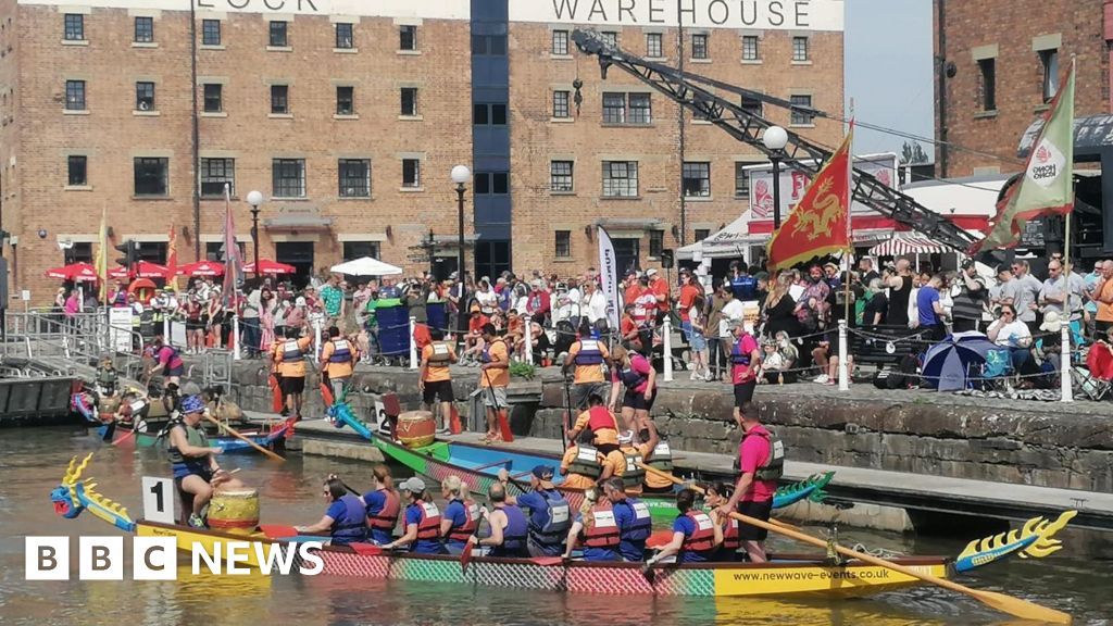 Gloucester's annual dragon boat race returns to the docks - BBC News