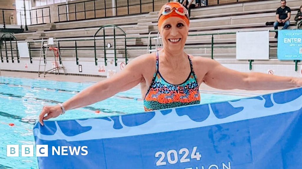 Swimathon: Woman living with incurable cancer swims for charity - BBC News