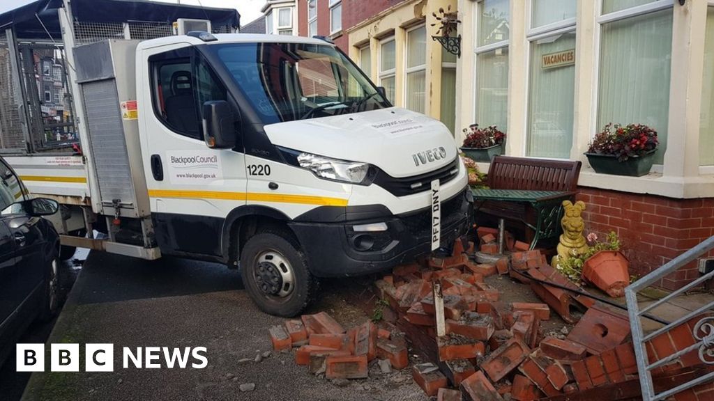 'Shock' as Blackpool Council van crashes through wall - BBC News