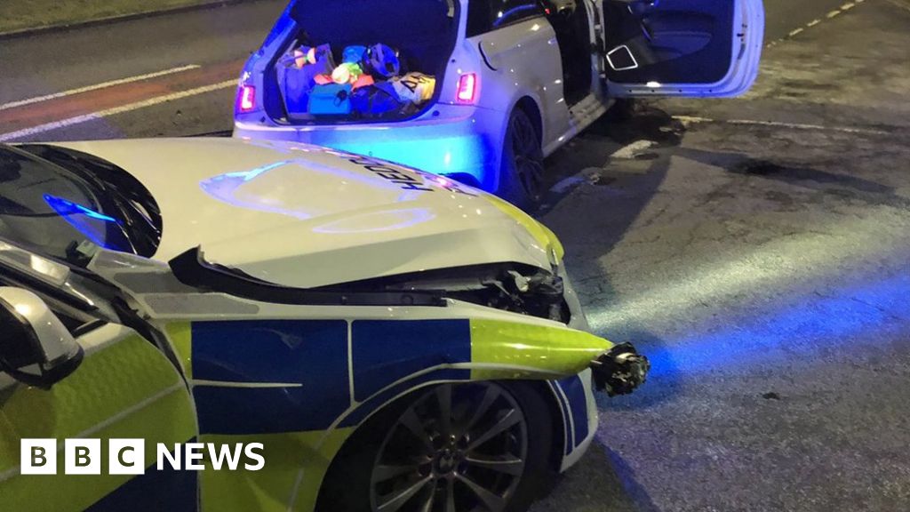 Police car rammed by Audi in high-speed A55 chase - BBC News