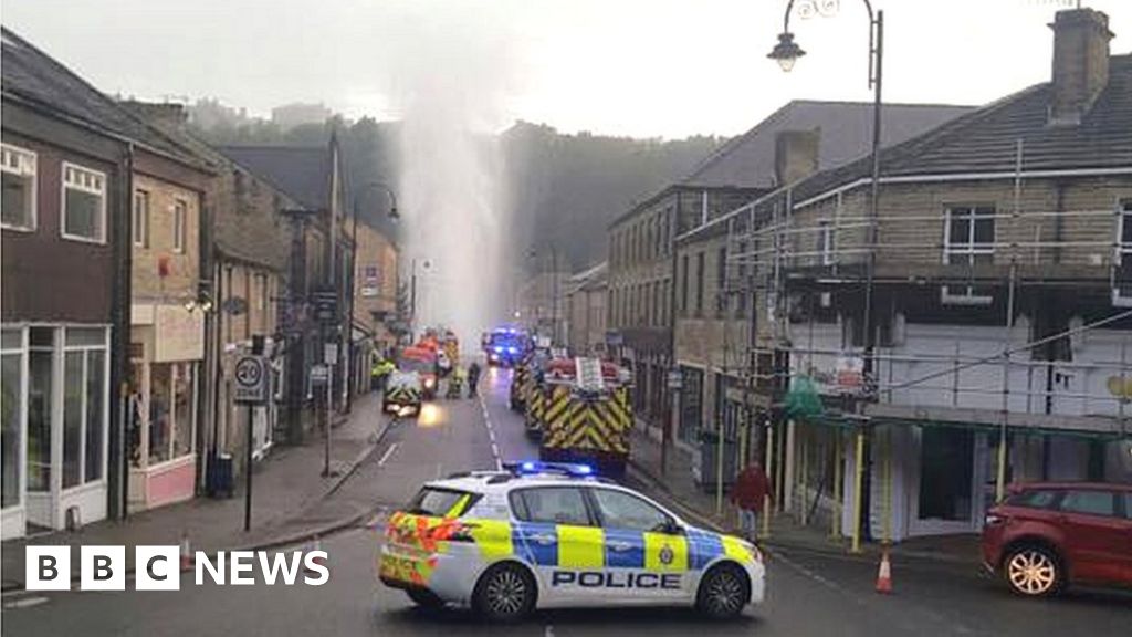 Damaged fire hydrant causes 30ft water spout in village - BBC News