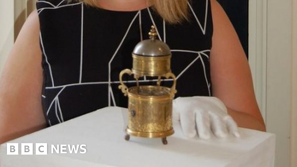 Stolen 16th Century clock back on display after 55 years - BBC News