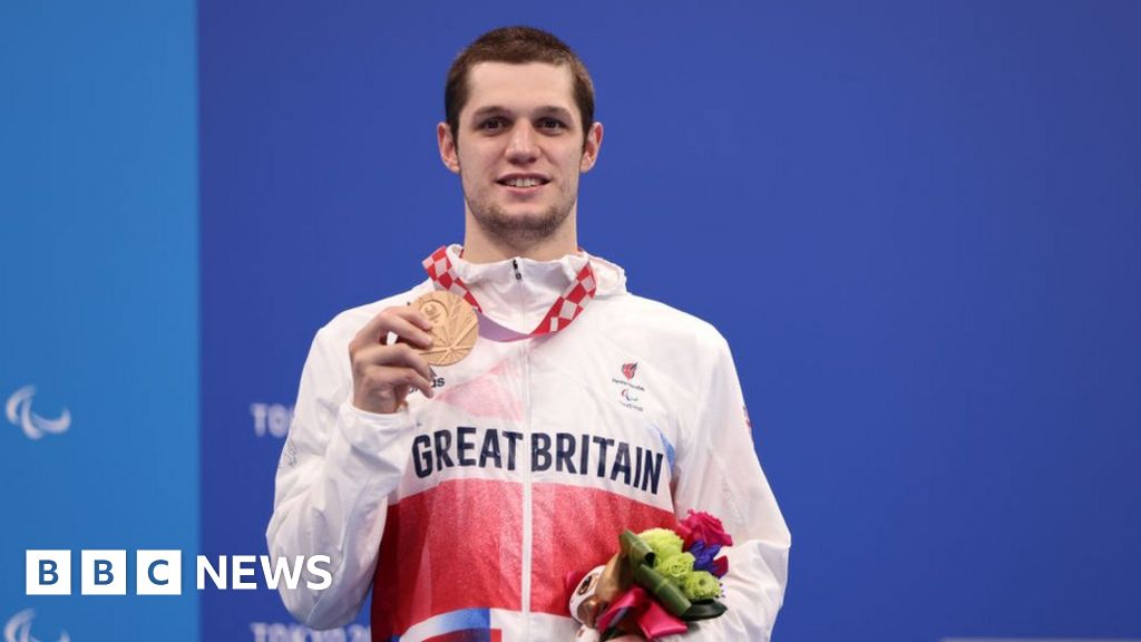 Reece Dunn: Paralympic swimmer 'shocked' to get MBE - BBC News