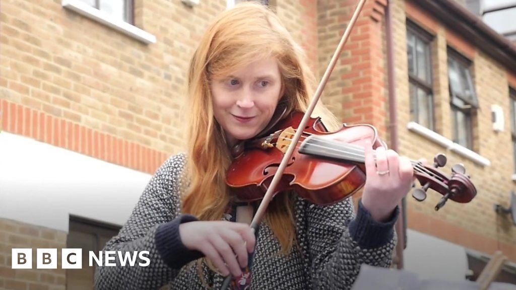 London street orchestra cheering up self-isolators