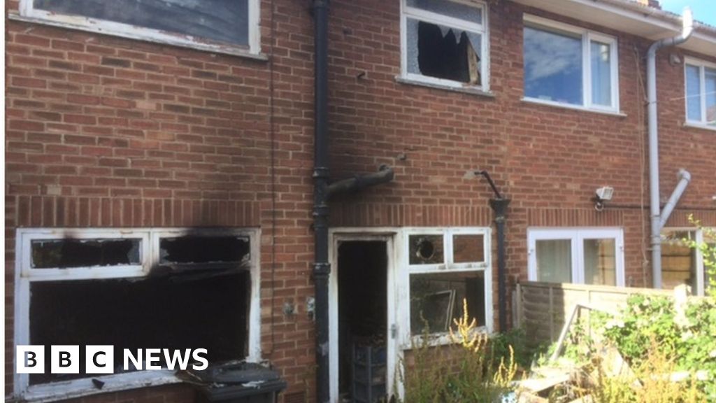 Lowestoft 'cluttered' house fire killed disabled man and carer - BBC News
