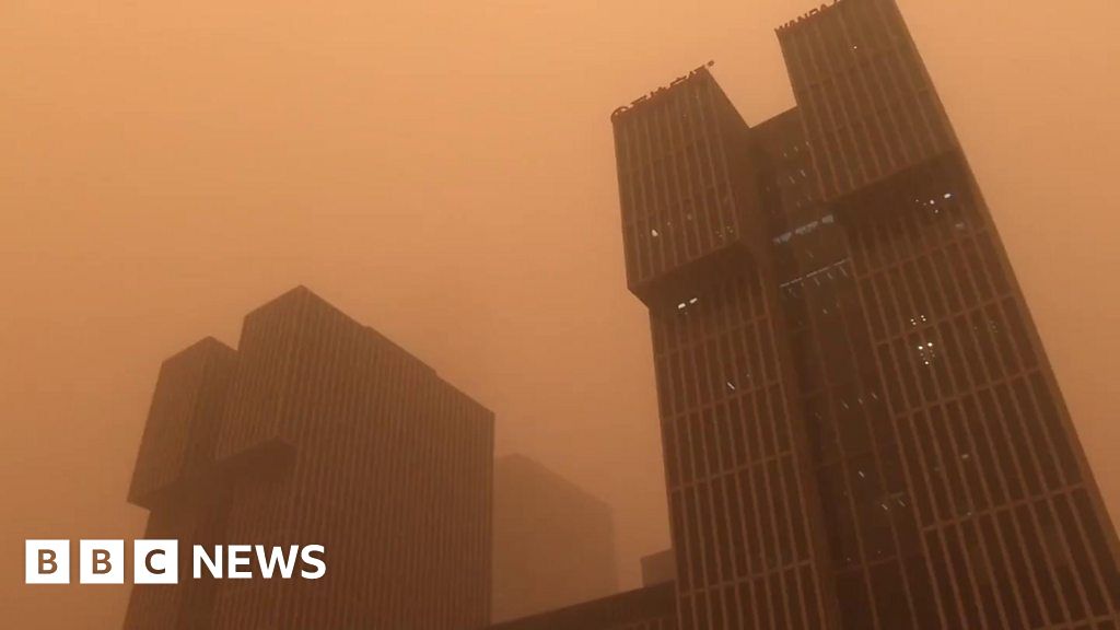 Beijing sandstorm: City turns orange and transport disrupted - BBC News