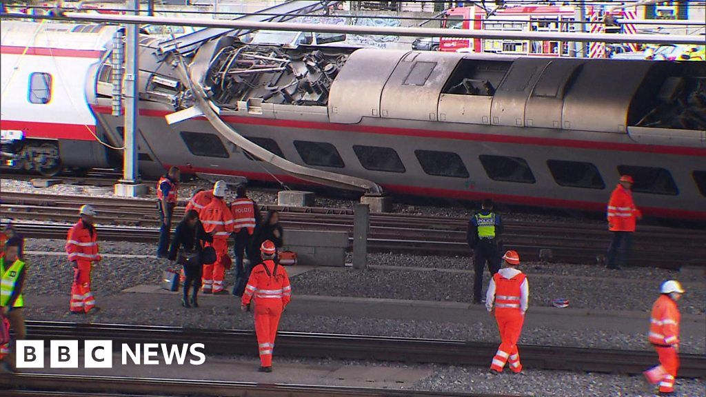 Passengers rescued after train derails in Switzerland - BBC News