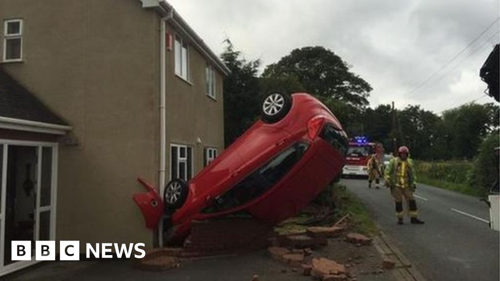 Upturned car hits Shropshire house after crash - BBC News