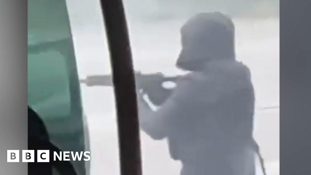 France prison van ambush gunmen seen from passing bus