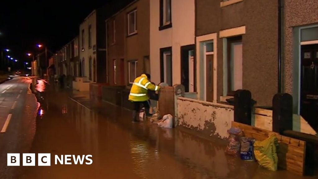 Cumbria hit by flooding after heavy rain - BBC News