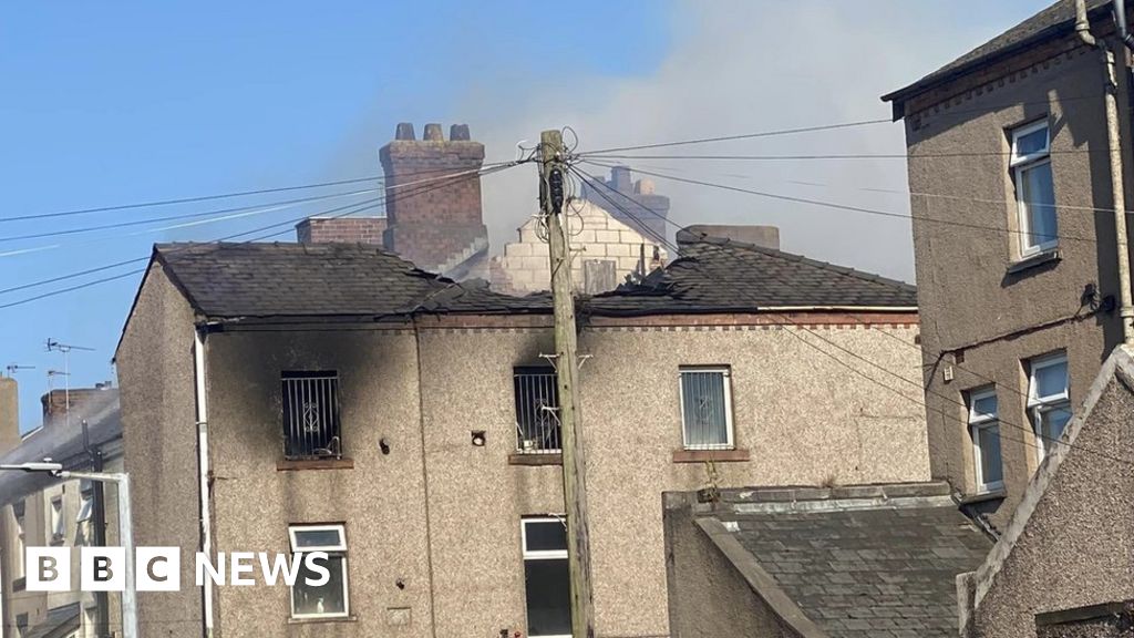 Barrow fire: Row of terraced houses damaged in blaze - BBC News