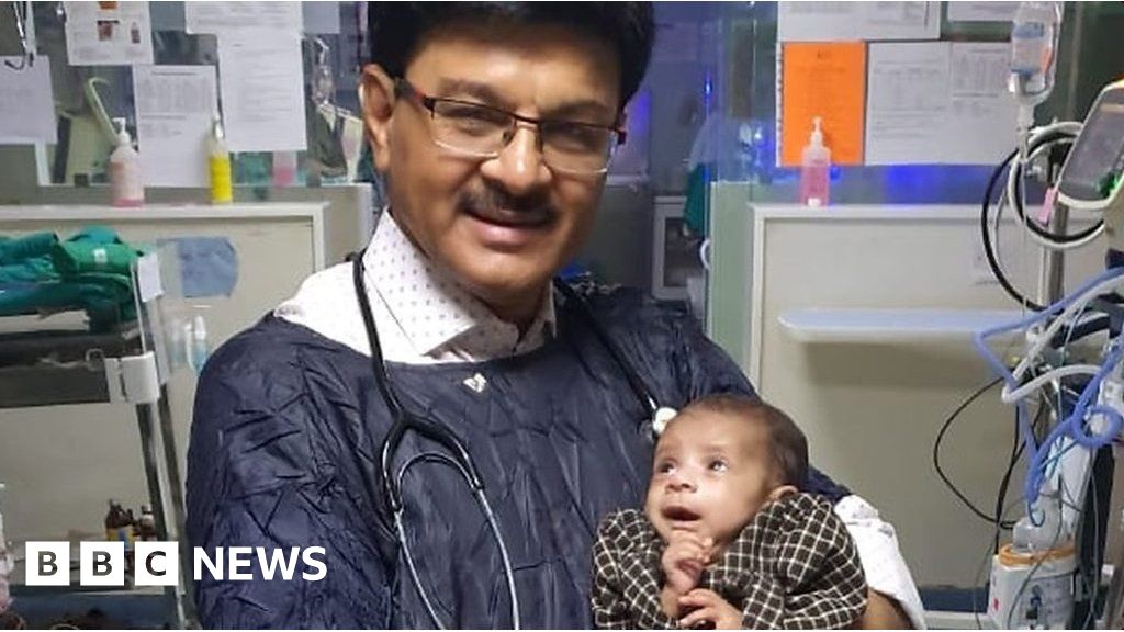 Baby saved from grave in India now 'totally healthy' - BBC News