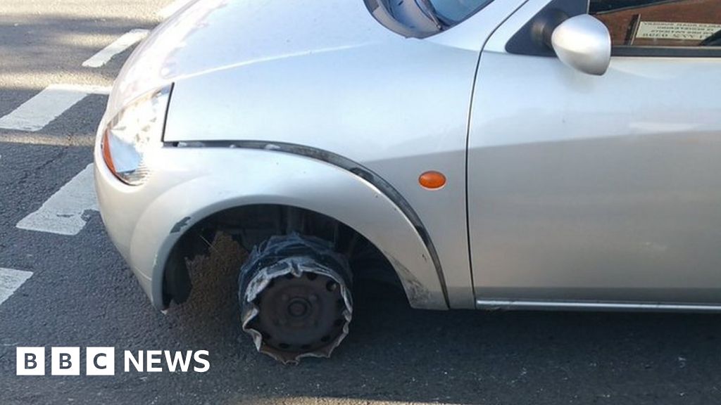 Birmingham driver uses car with no tyre to go to shops - BBC News