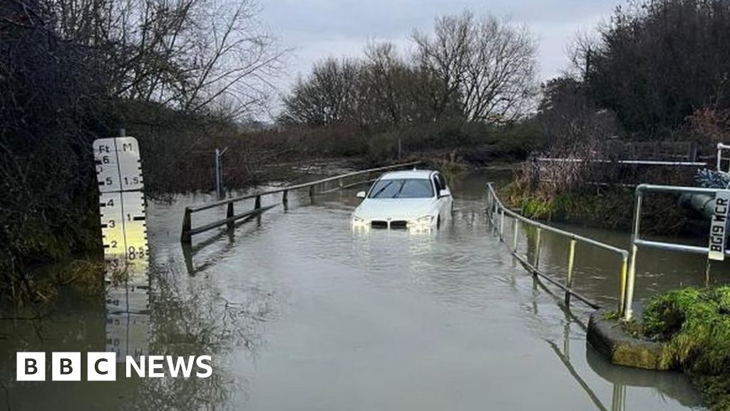 Driver rescued from Buttsbury Wash flood water