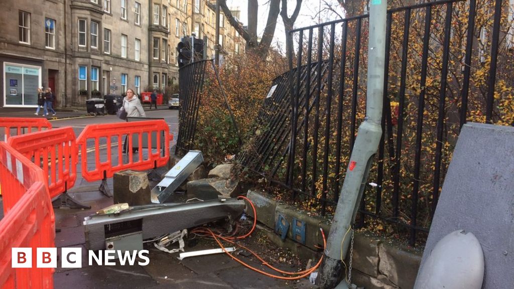 Four seriously injured after car overturns in Edinburgh street crash - BBC News