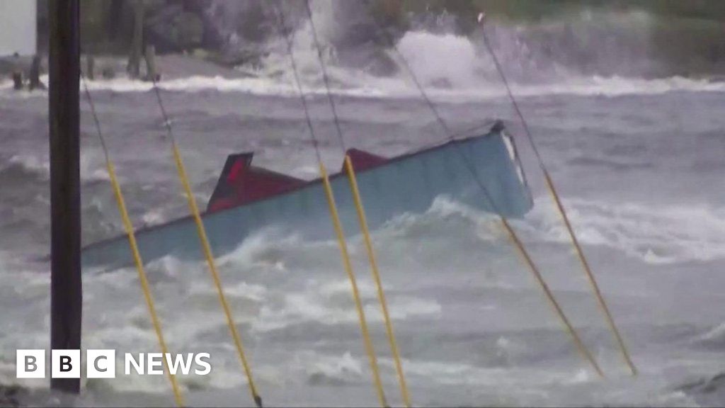Storm Fiona hits Canada's Atlantic coastline - BBC News